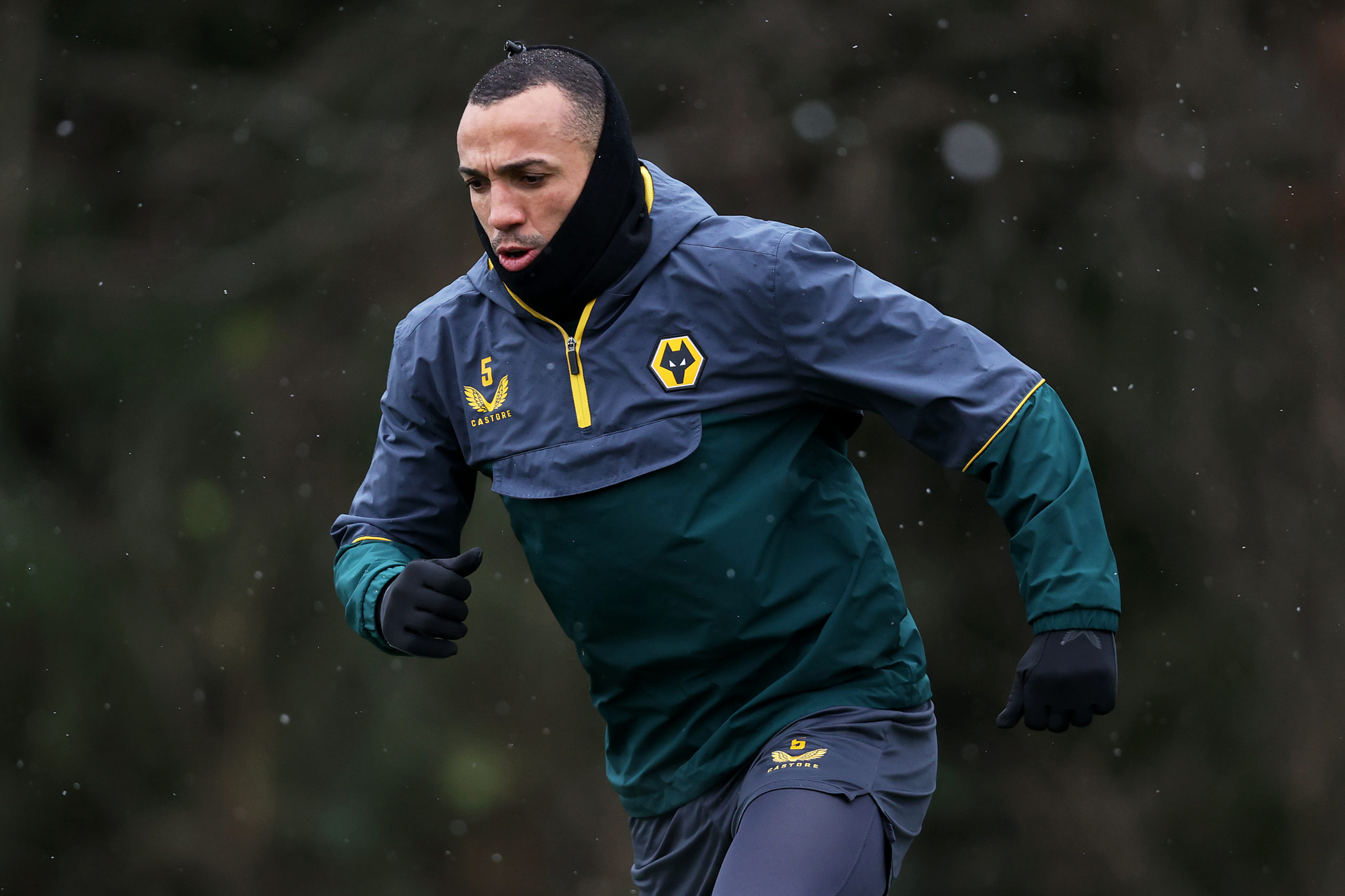 Photos: Marcal pictured training on the beach during Wolves time off